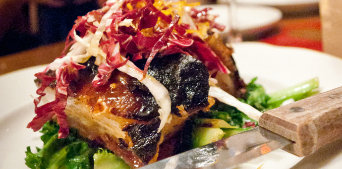 Tomas Curi's Crispy Braised Mangalitsa Belly with Bitter Greens and Citrus